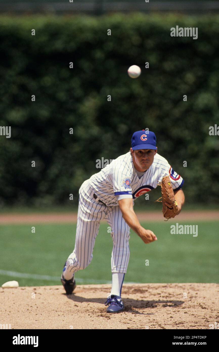 Chicago Cubs pitcher Greg Maddux pitches during a game. Circa Braves ...