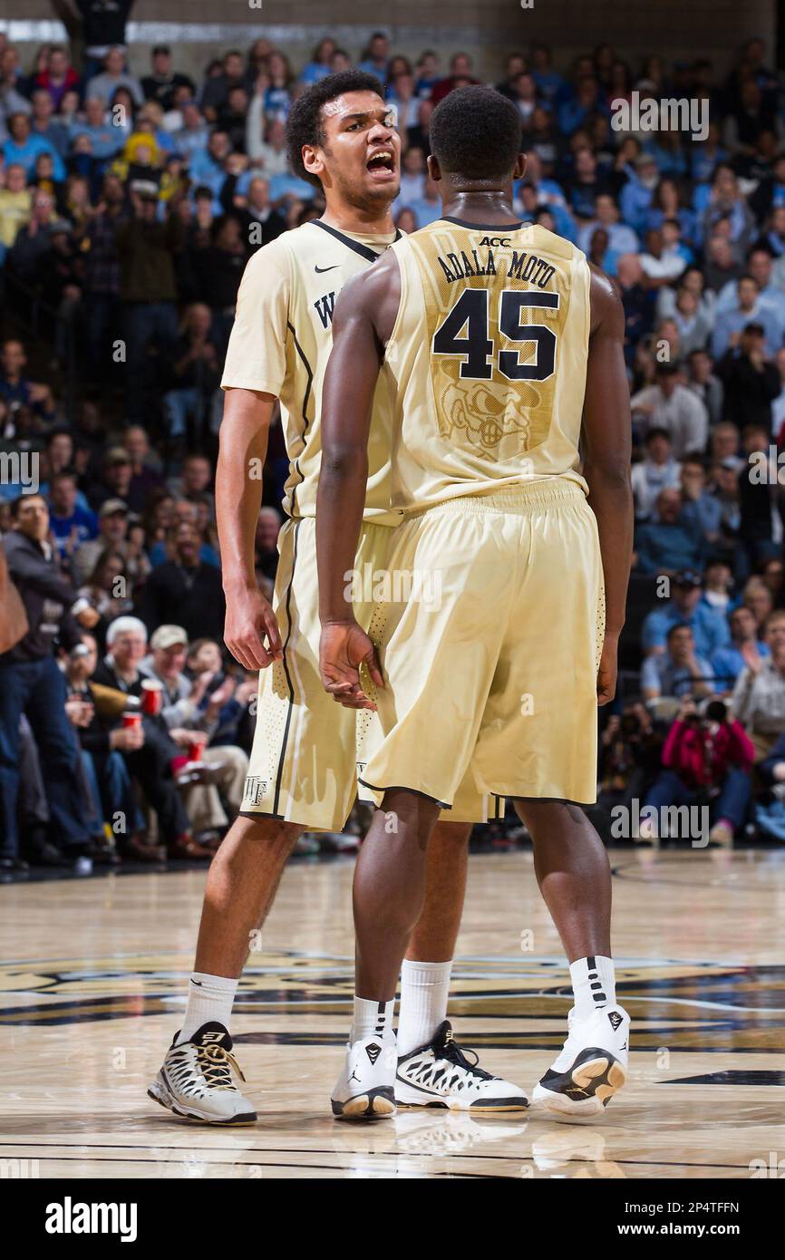 Devin Thomas (2) of the Wake Forest Demon Deacons chest bumps teammate ...