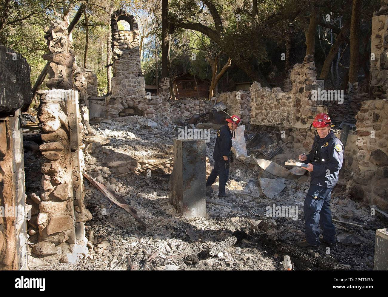 Orange County Fire Authority investigators Bill Lackey and Rich ...