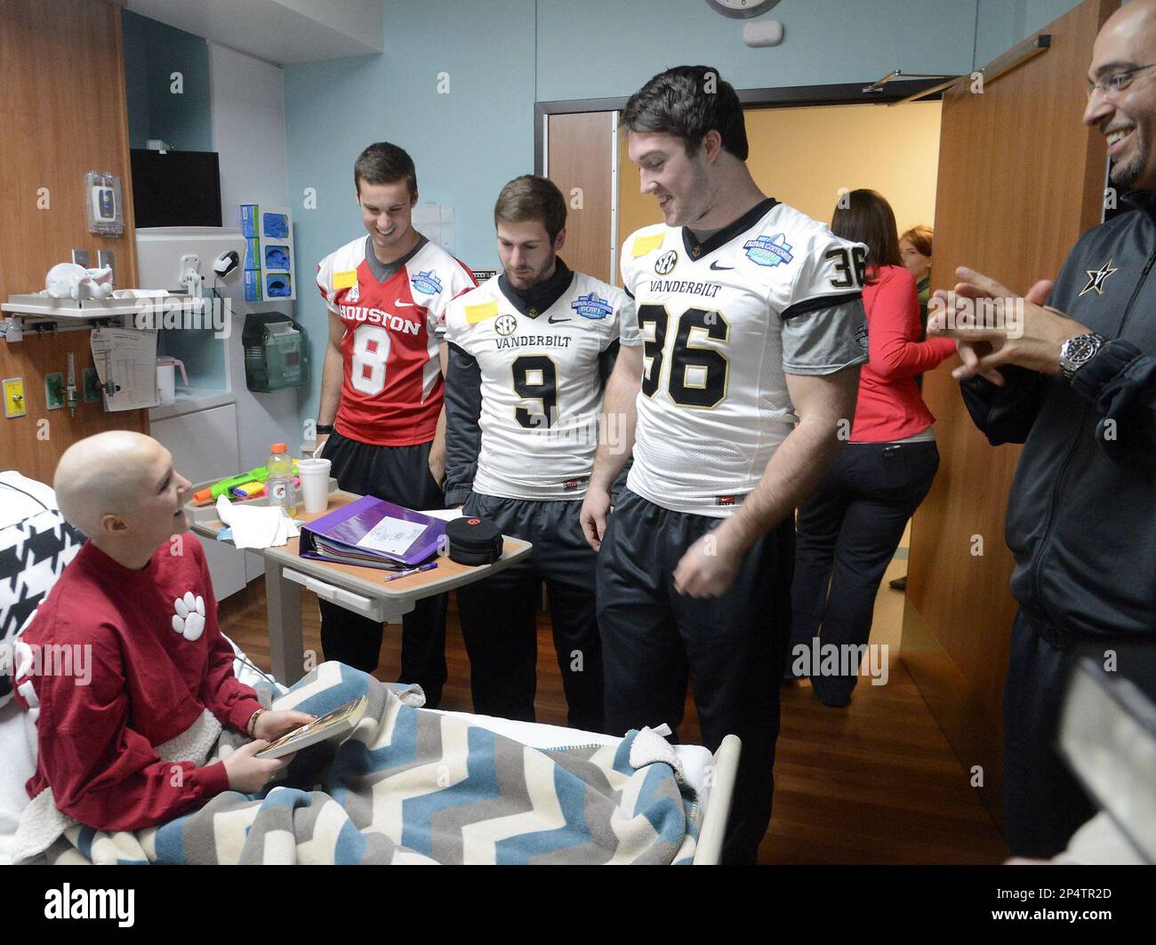 From left, Houston quarterback David Piland, Vanderbilt wide receiver ...