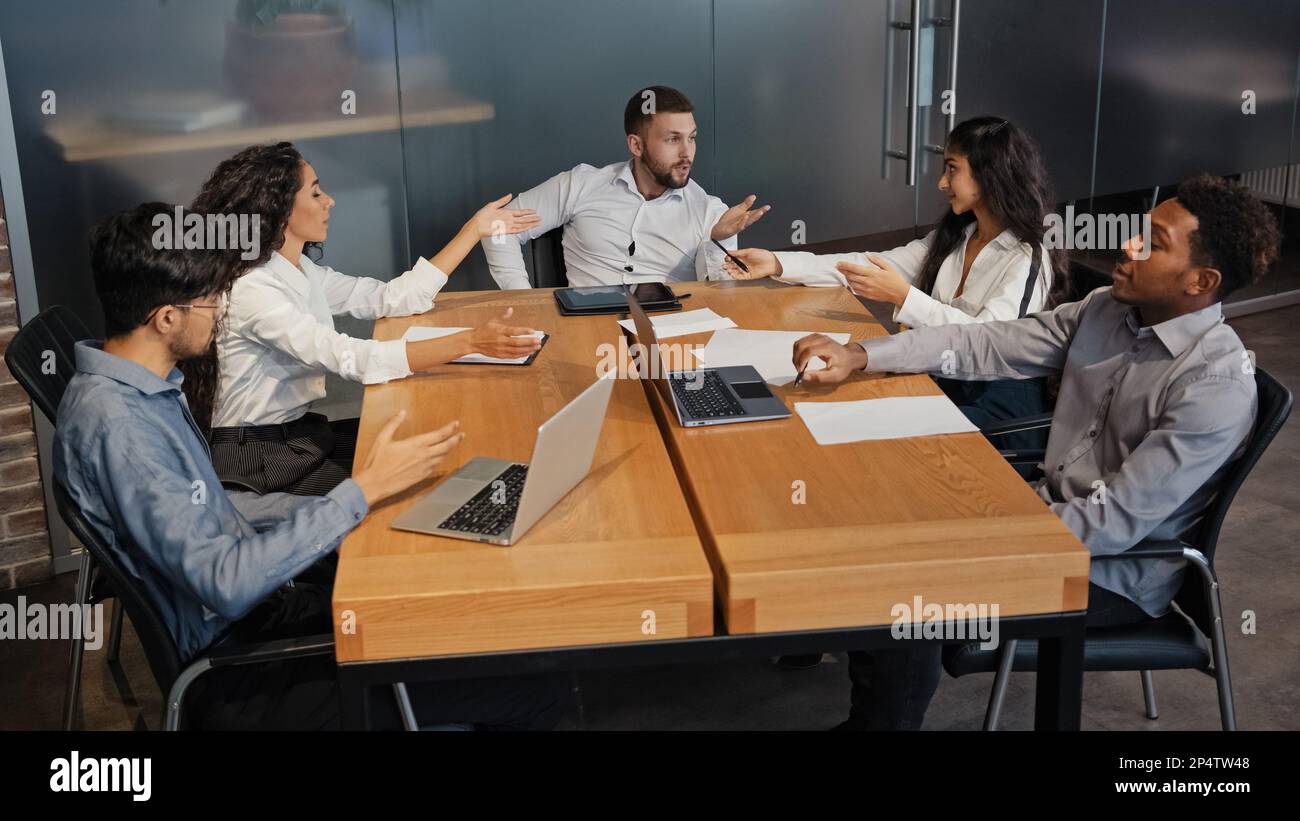 Diverse group businessmen analyze hi-res stock photography and images ...