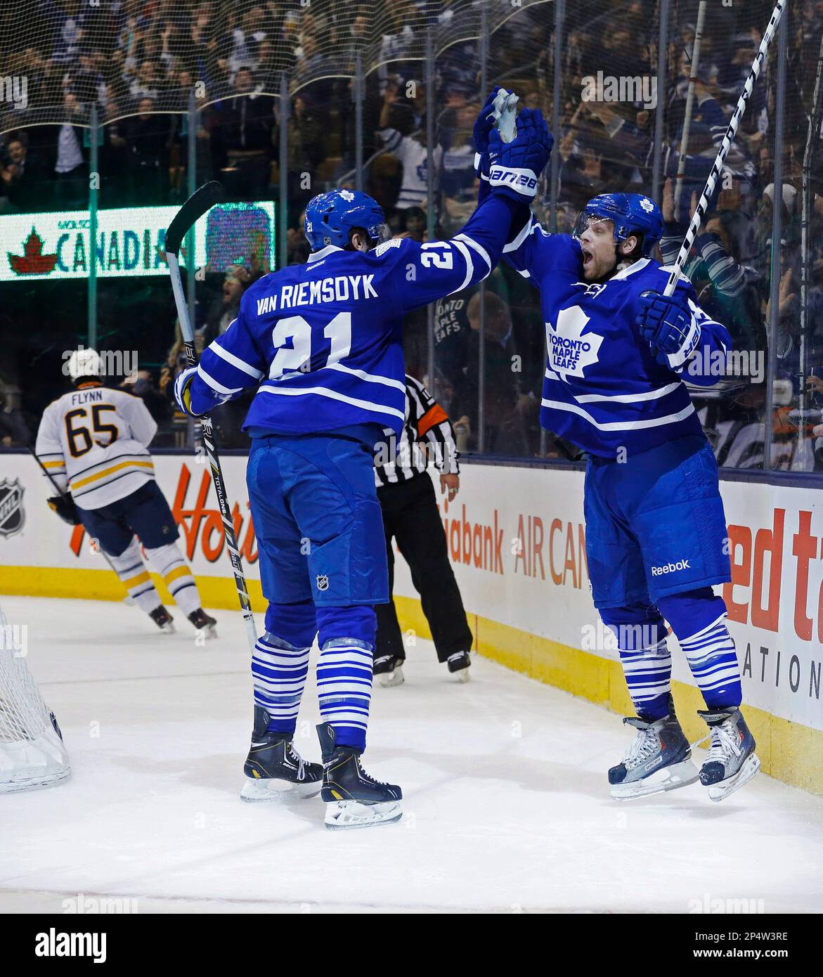 Toronto Maple Leafs' Phil Kessel, right, celebrates his goal with James ...