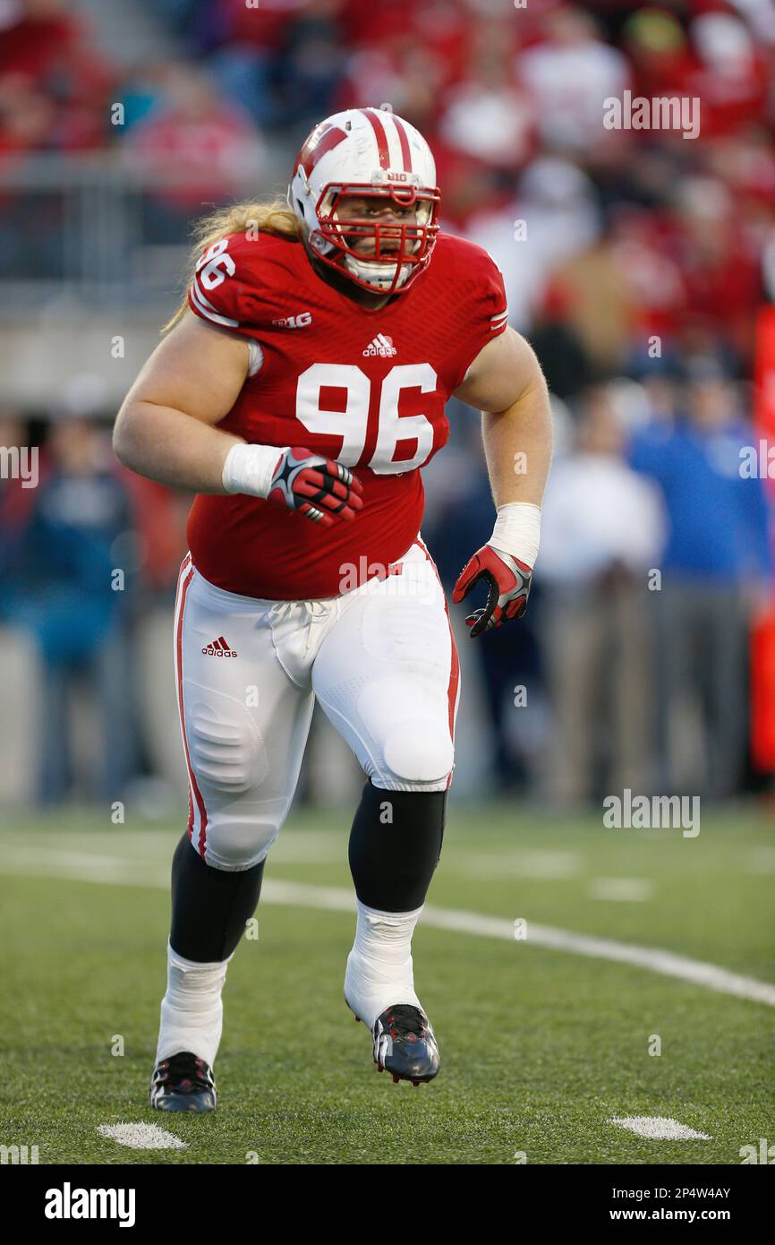 Wisconsin nose tackle Beau Allen (96) runs during an NCAA Football game ...