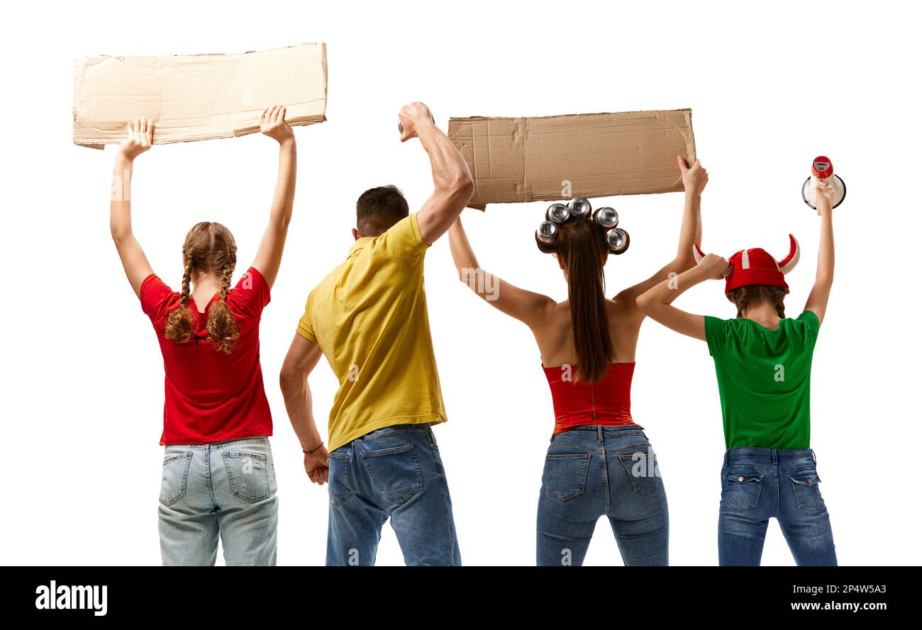 Back view. Group of young people protesting, emotionally shouting over ...