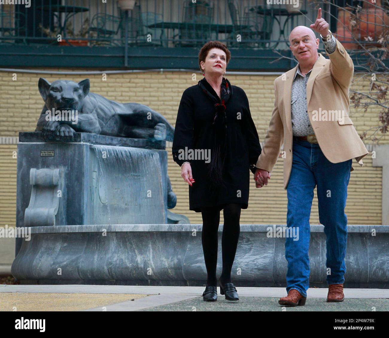 This Dec. 20, 2013 photo shows Terry Huston, right, and his wife Susan ...
