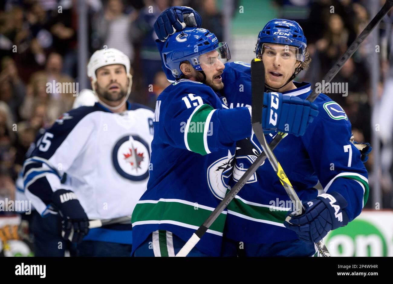 Vancouver Canucks' Brad Richardson and David Booth, right, celebrate ...