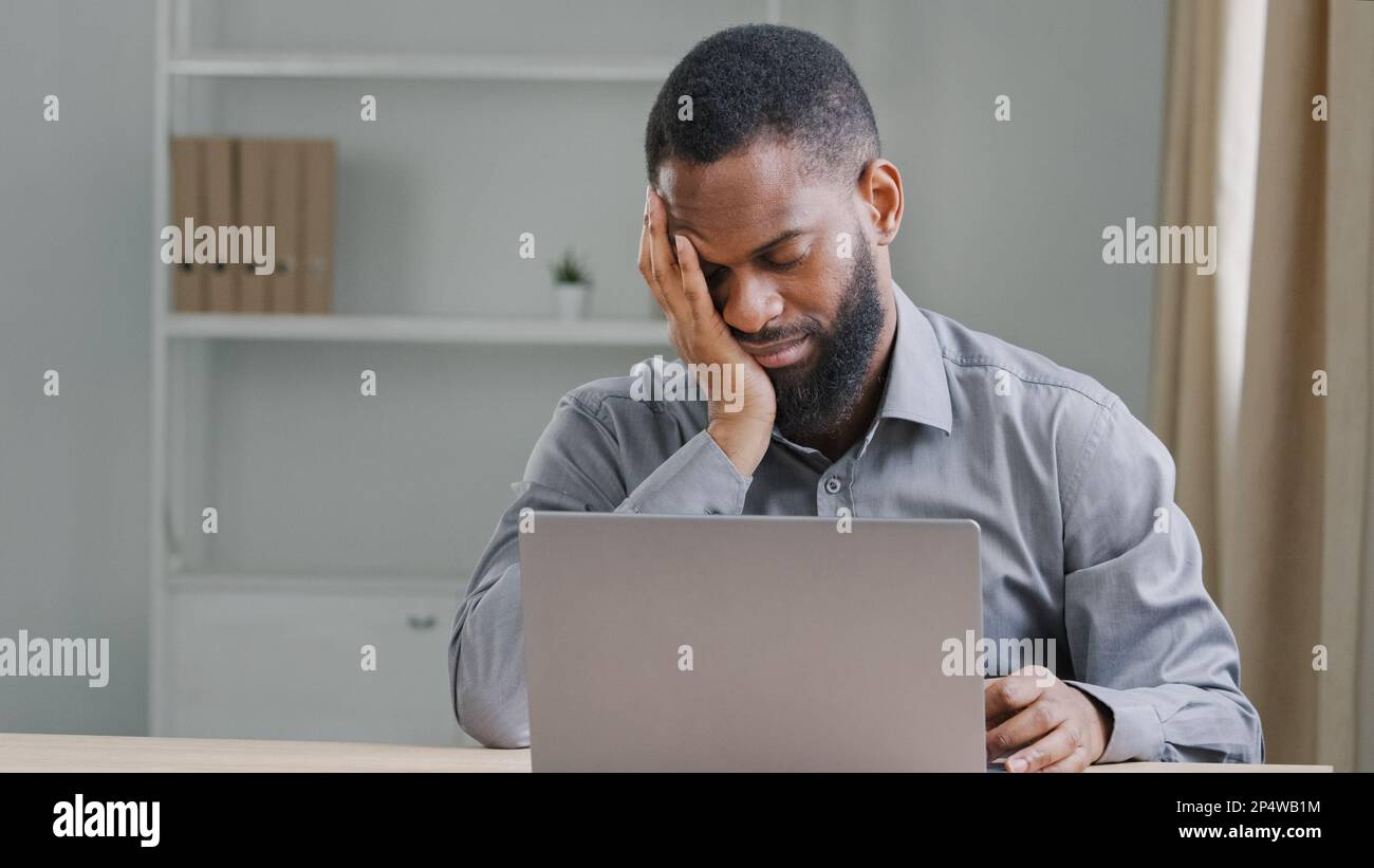 Tired businessman laptop falling asleep hi-res stock photography and ...