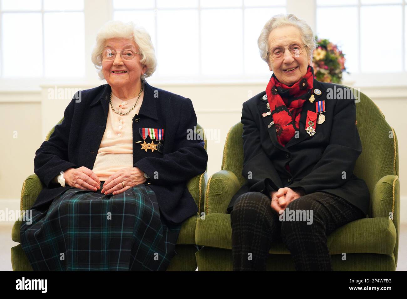 WWII veteran Mildred Schutz, 99, (left) and Marie Scott, 96, during the ...