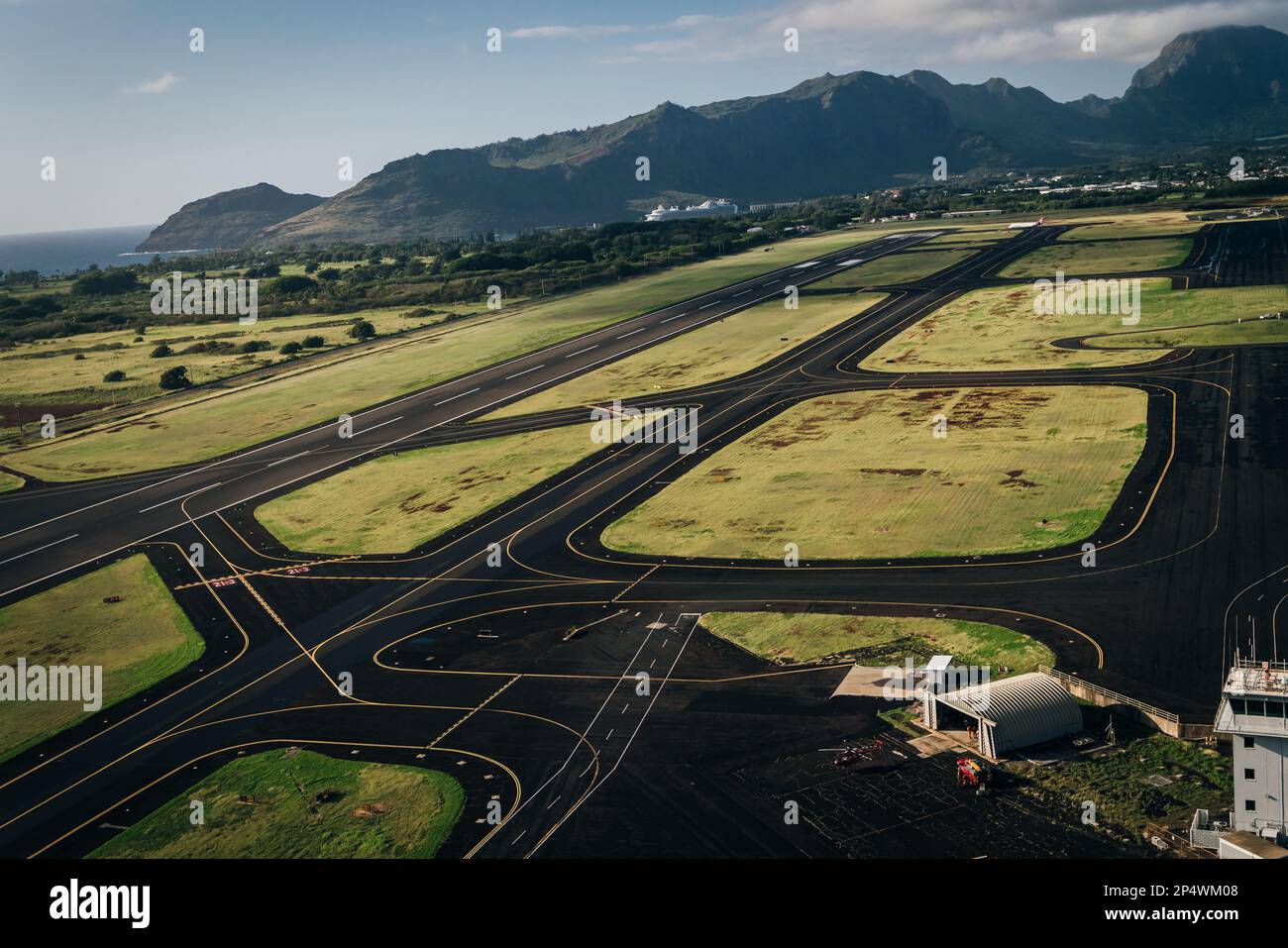 Aerial view of the runway and plane hangars of Lihue airport on Kauai ...