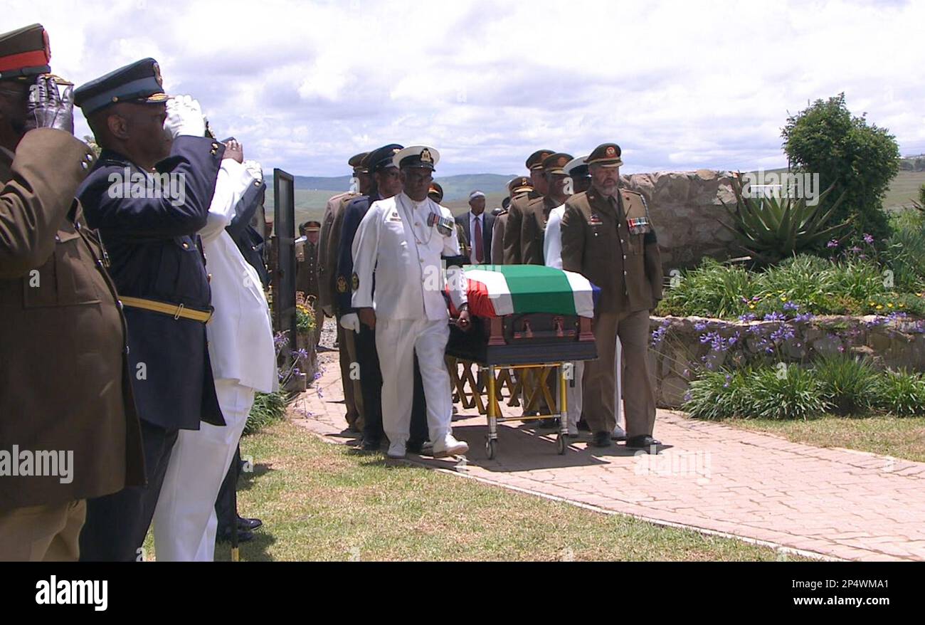 In this video frame grab, military officers escort former South African ...