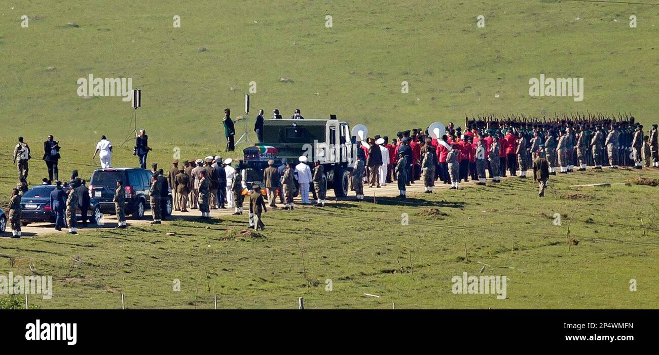 The casket of Nelson Mandela is brought in a military parade on a gun ...