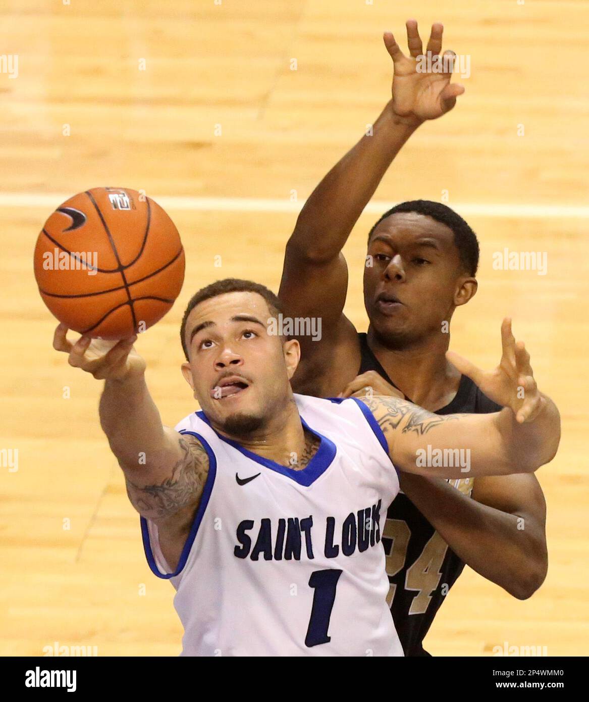 St. Louis University forward Grandy Glaze (left) competes for a rebound ...