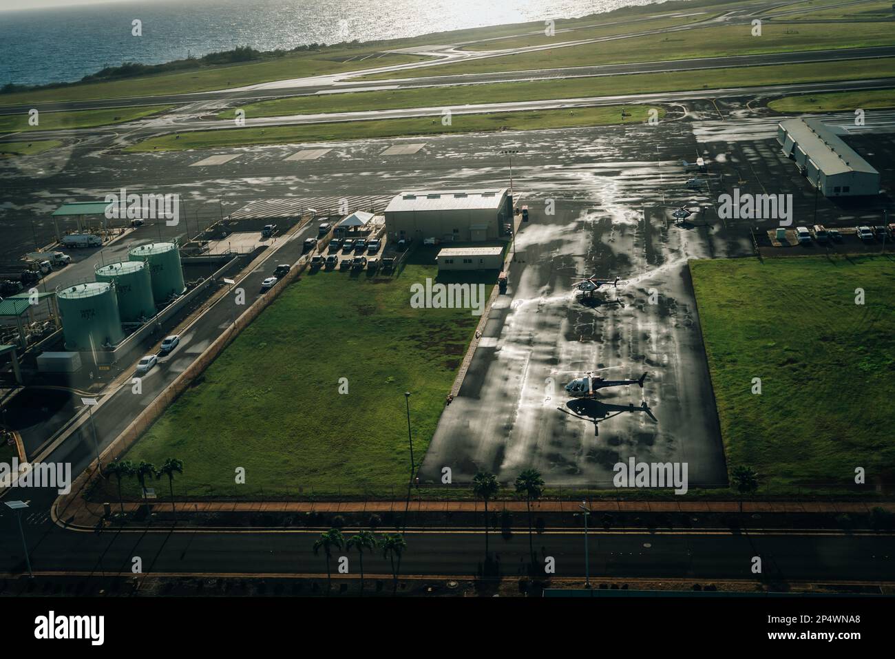 Aerial view of the runway and plane hangars of Lihue airport on Kauai ...