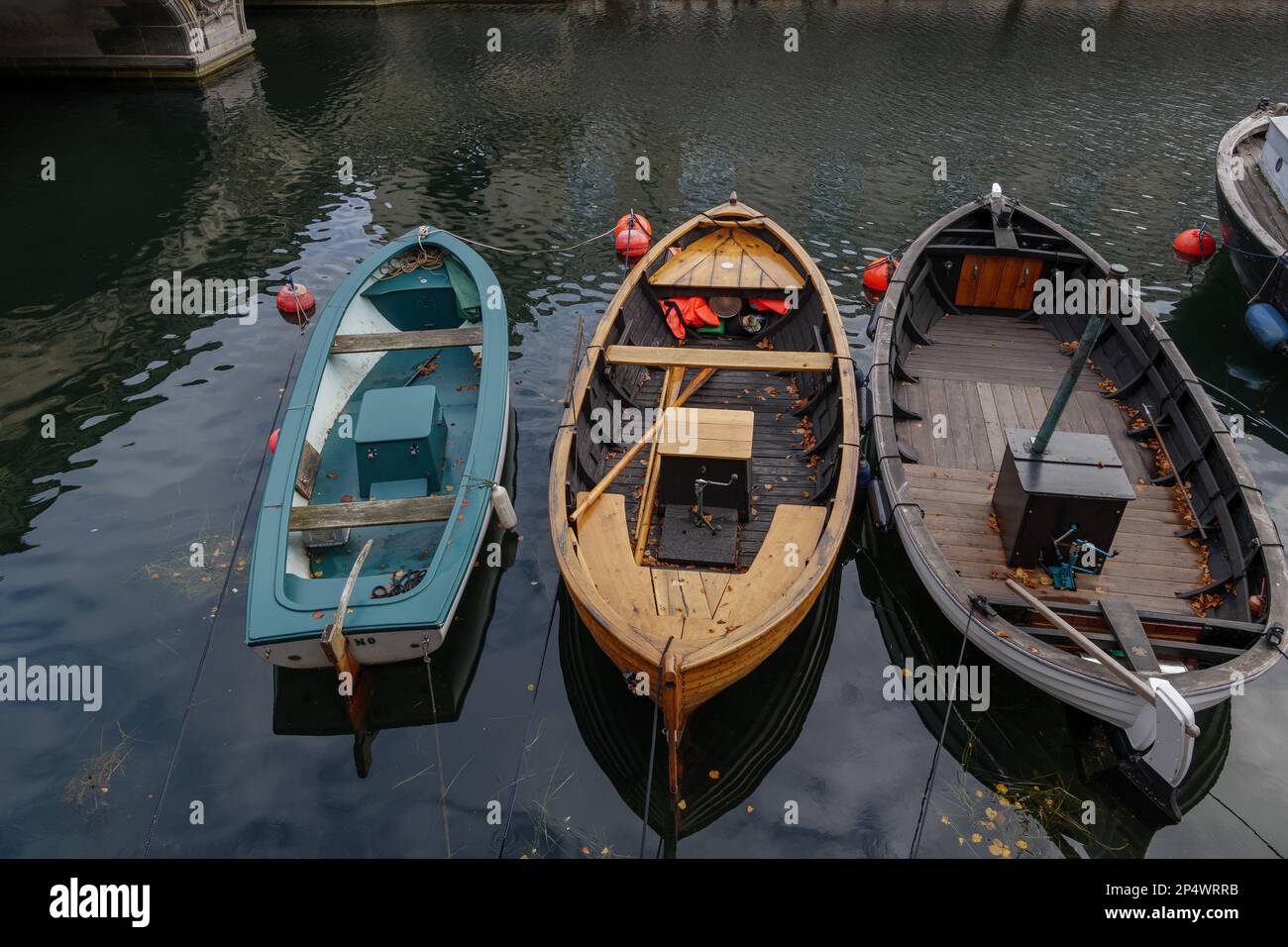 Top view group of small boats docks on the canal in Copenhagen, Denmark ...
