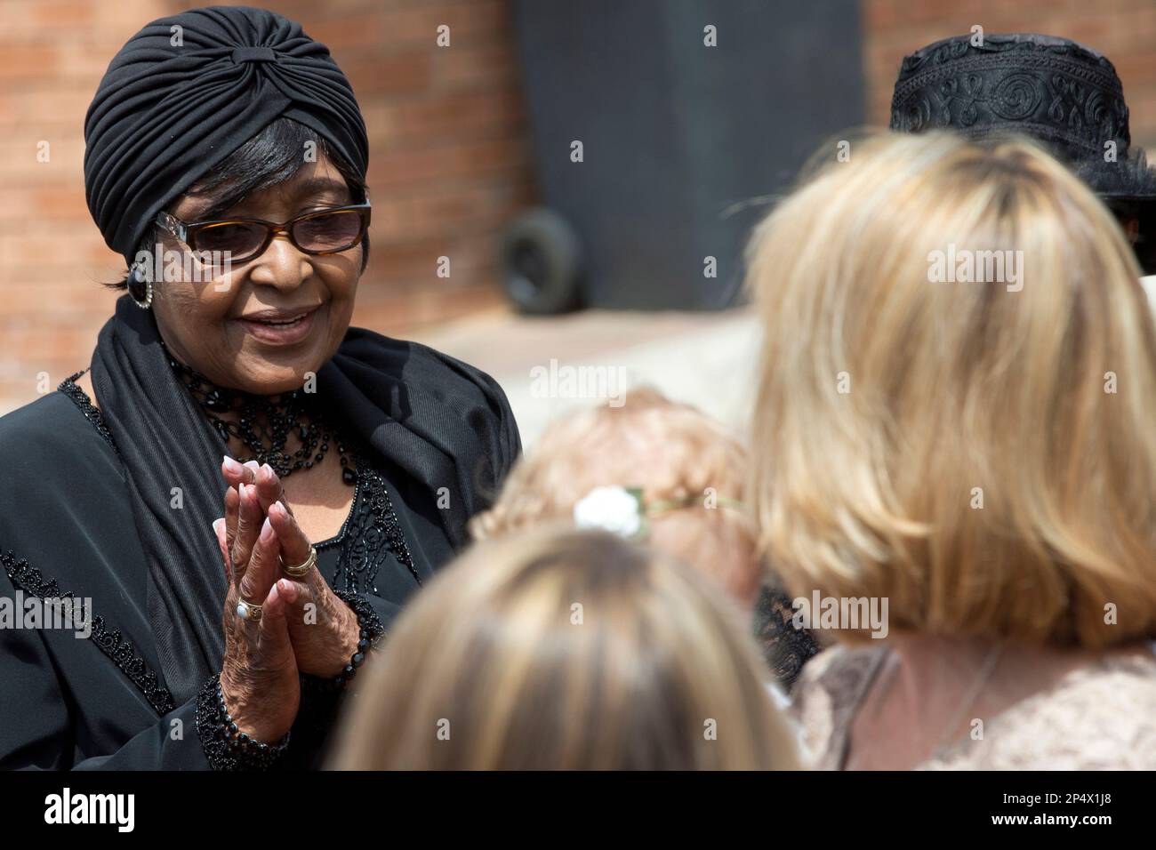 Winnie Madikizela-Mandela, left, Nelson Mandela's former wife, greets ...