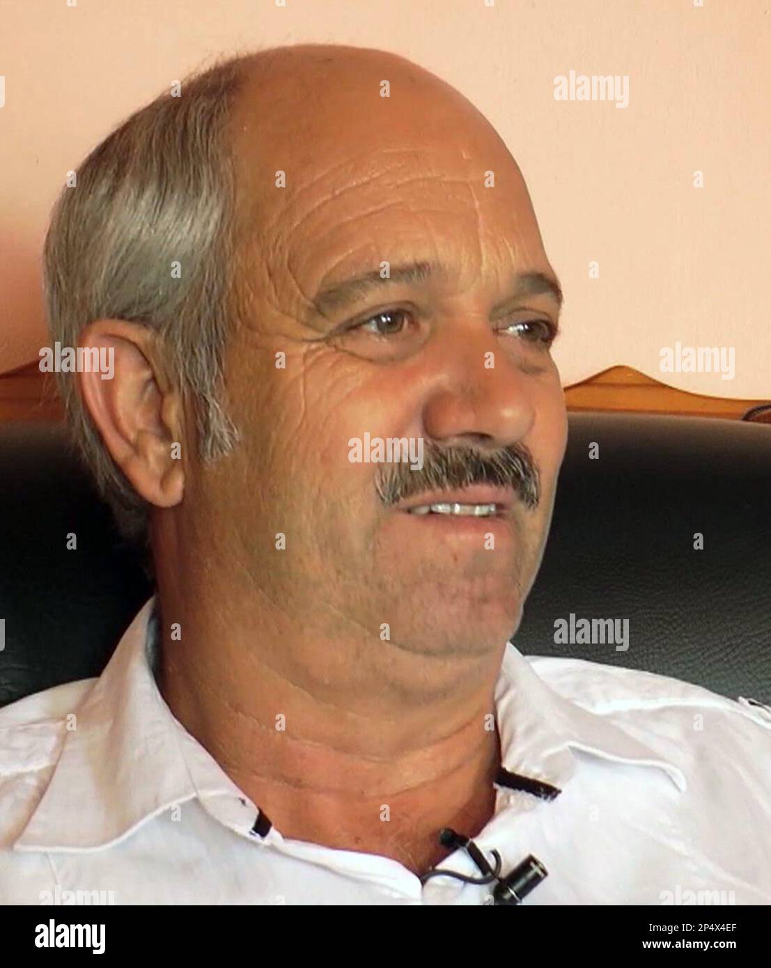 In this image from TV, Christo Brand the Robben Island jailer talks to ...