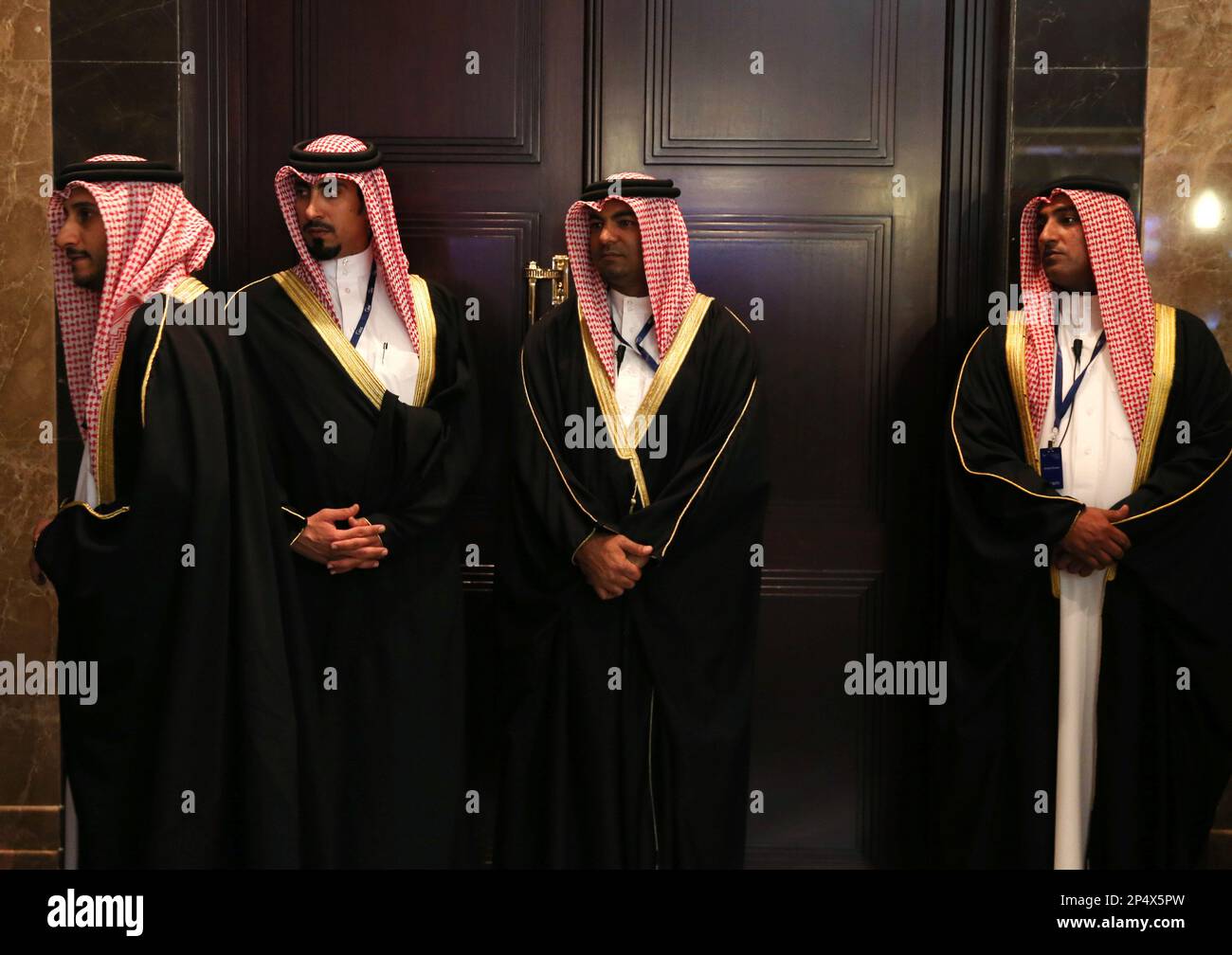 Security personnel stand guard outside the room where Crown Prince of ...