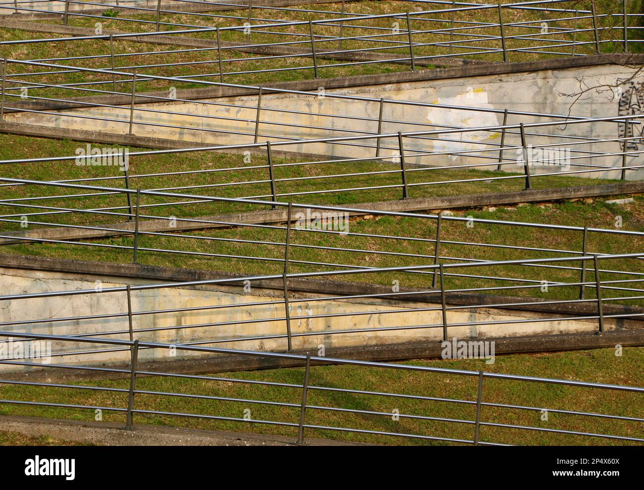 Exterior wheelchair accessibility zig zag ramp slope with metal ...