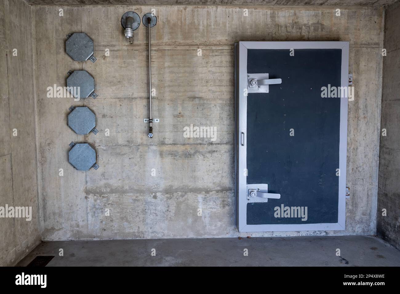 Entrance Door to a Bunker in a Sunny Day in Arzo, Ticino, Switzerland Stock Photo - Alamy