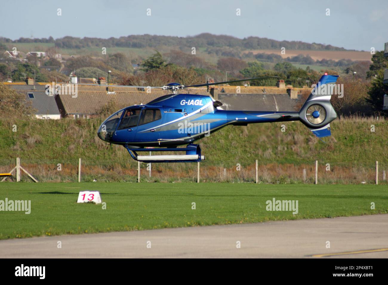 A Eurocopter EC 120B Colibri helicopter departs Brighton City Airport ...