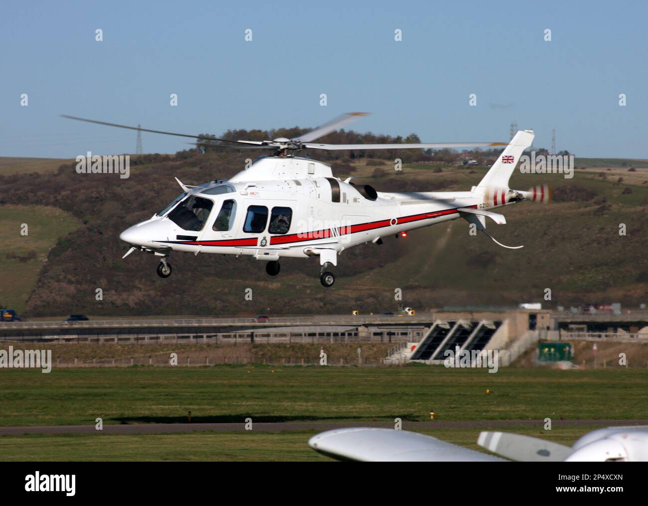 Agusta A109E Power helicopter, GZ100 of RAF 32 Squadron departs ...