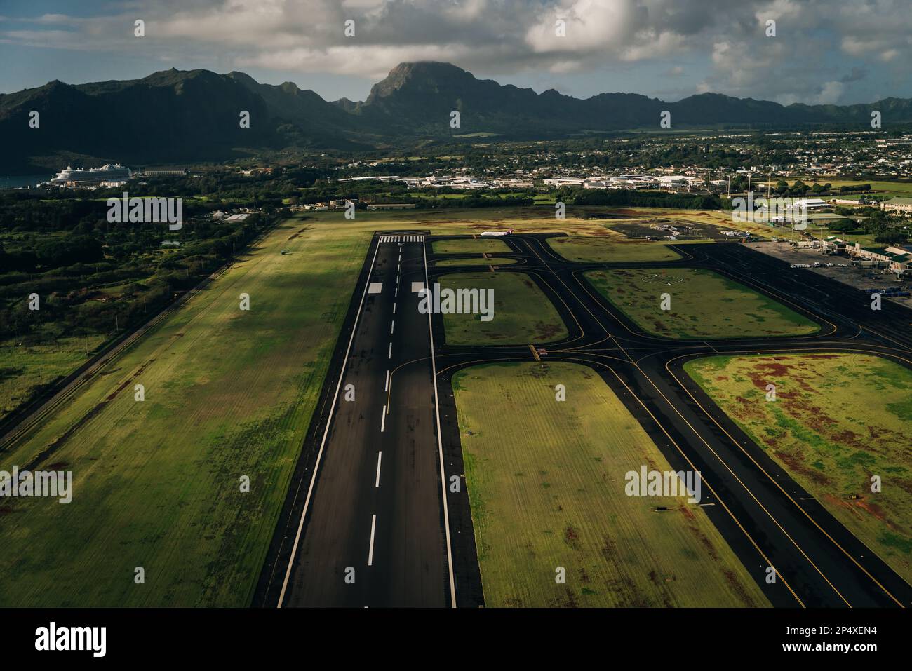 Aerial view of the runway and plane hangars of Lihue airport on Kauai ...