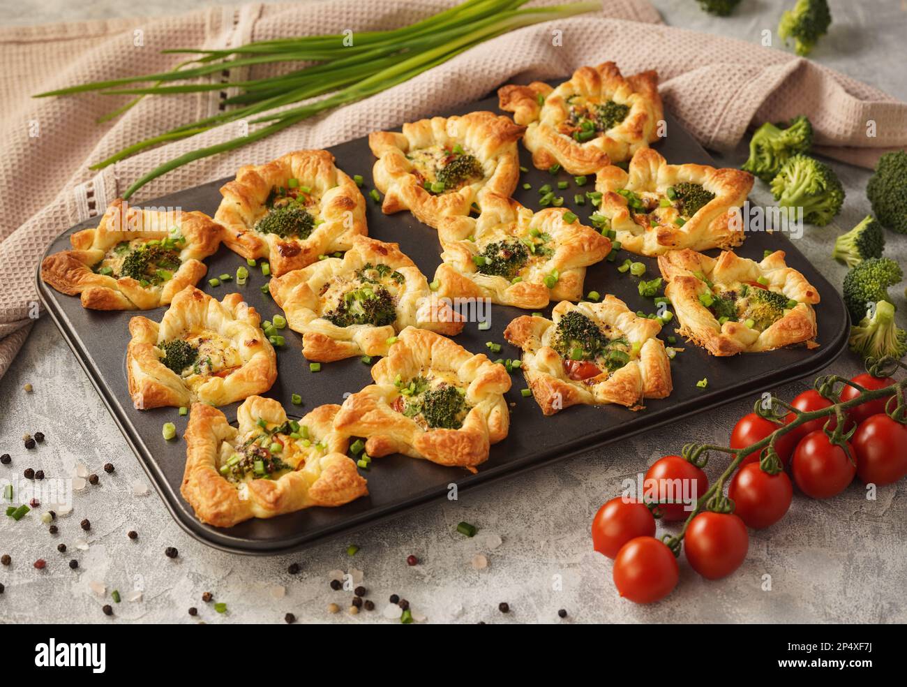 Savory puff pastry muffins with broccoli and mozzarella Stock Photo - Alamy