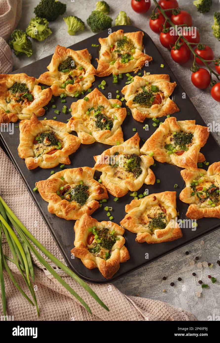 Savory puff pastry muffins with broccoli and mozzarella Stock Photo - Alamy