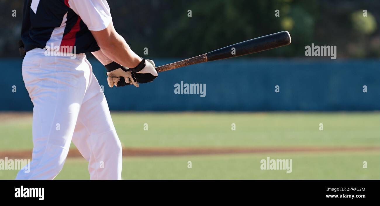 Baseball players in action on the stadium, baseball batter waiting to ...