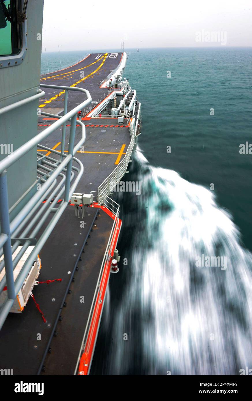The Chinese aircraft carrier Liaoning sails on the South China Sea as ...