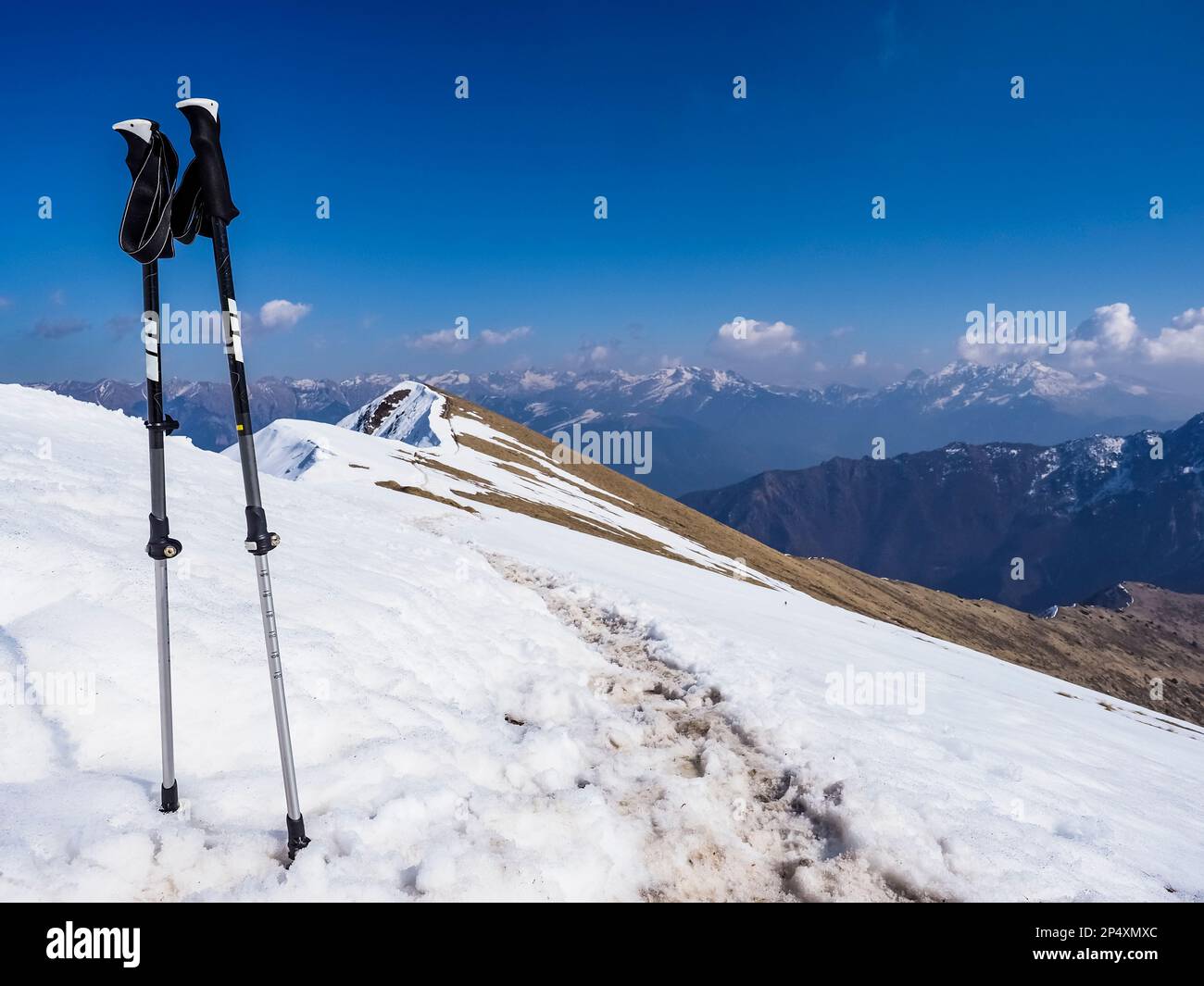 Trekking poles on an alpine trail in the italian alps Stock Photo - Alamy