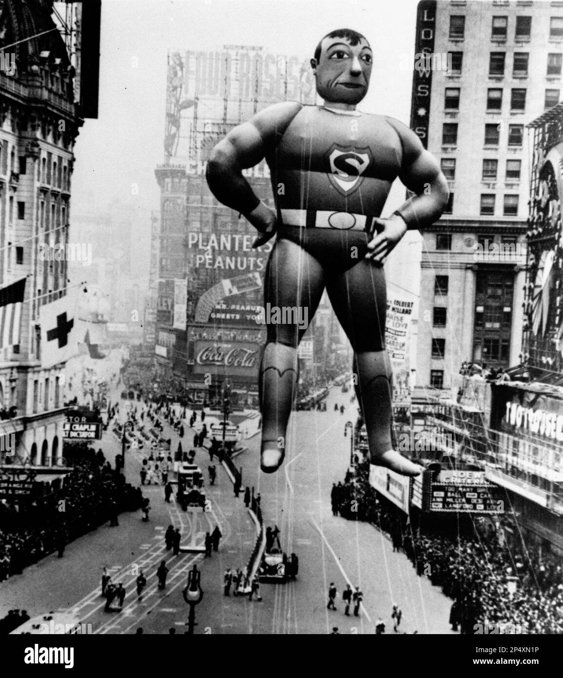 In this 1940 handout photo, a helium inflated Superman rises over Times ...