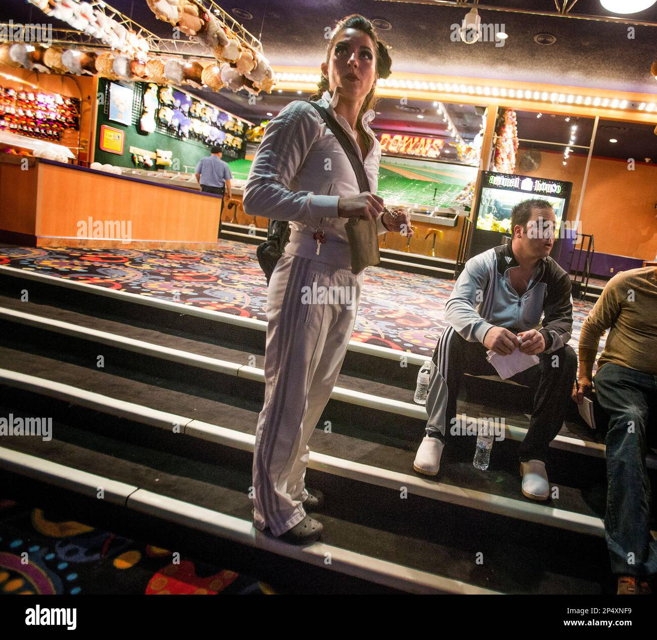 In this Tuesday, Nov. 12, 2013 photo, flying trapeze couple April Brown ...