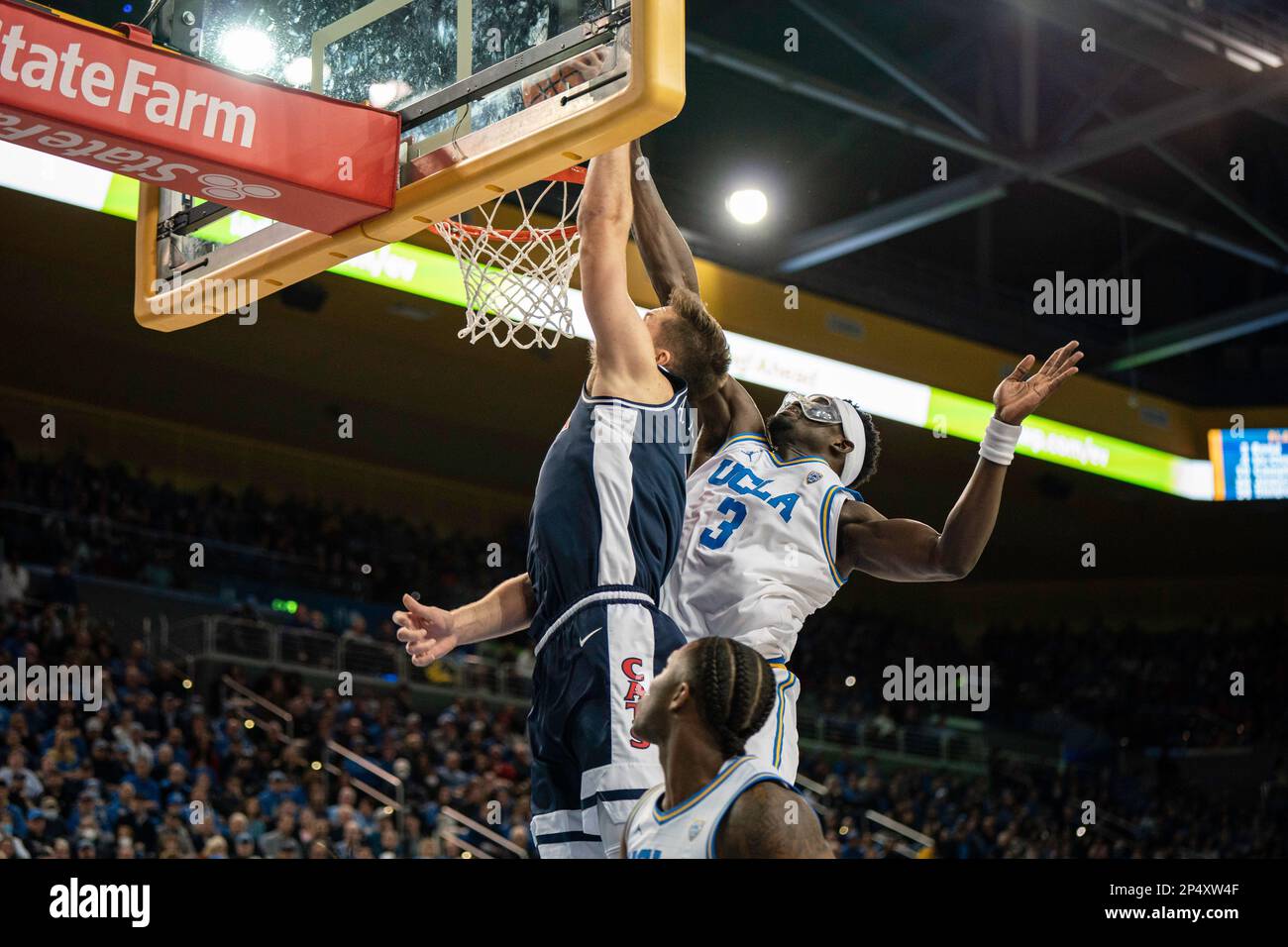 UCLA Bruins forward Adem Bona (3)fouls Arizona Wildcats forward Azuolas Tubelis (10) during a ...