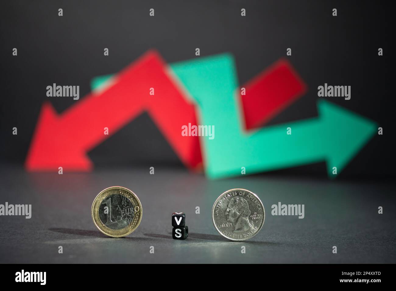 Euro versus dollar on black background. Red and green arrow intertwined ...