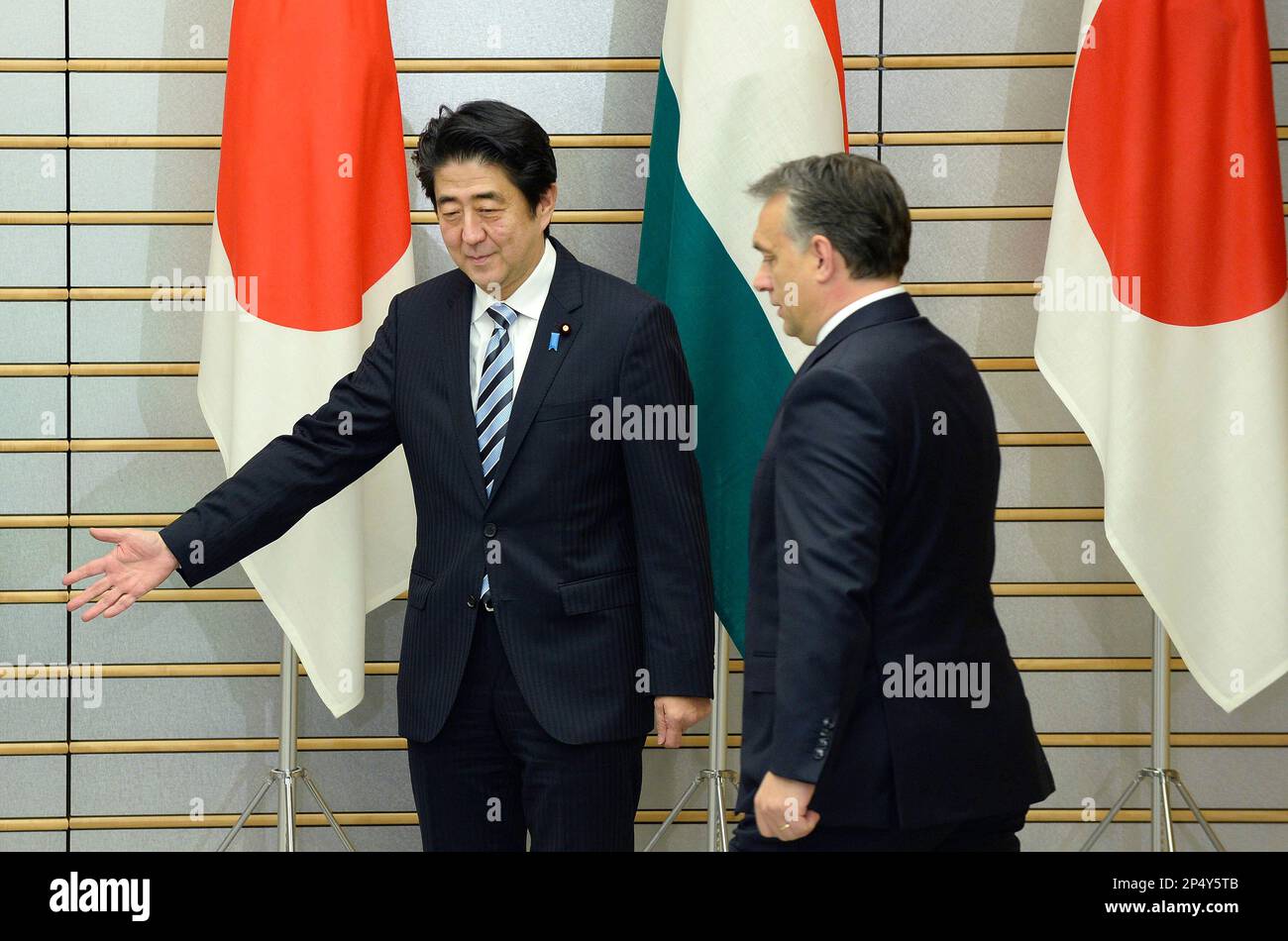 Japanese Prime Minister Shinzo Abe, left, welcomes his Hungarian counterpart Viktor Orban prior ...