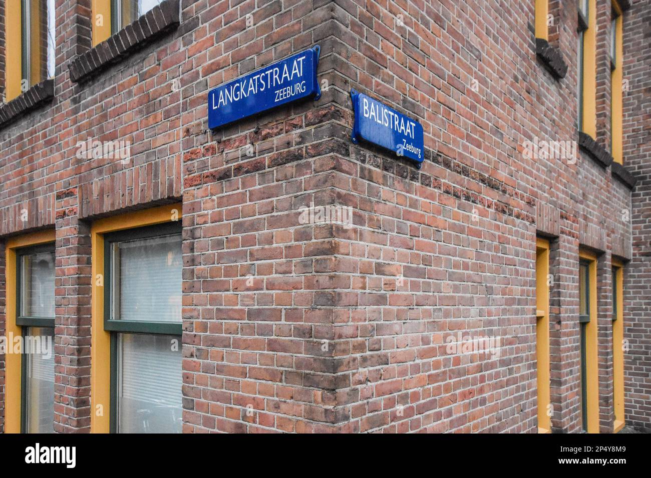 Amsterdam, Netherlands - 10 April, 2021: a street sign on the side of a ...