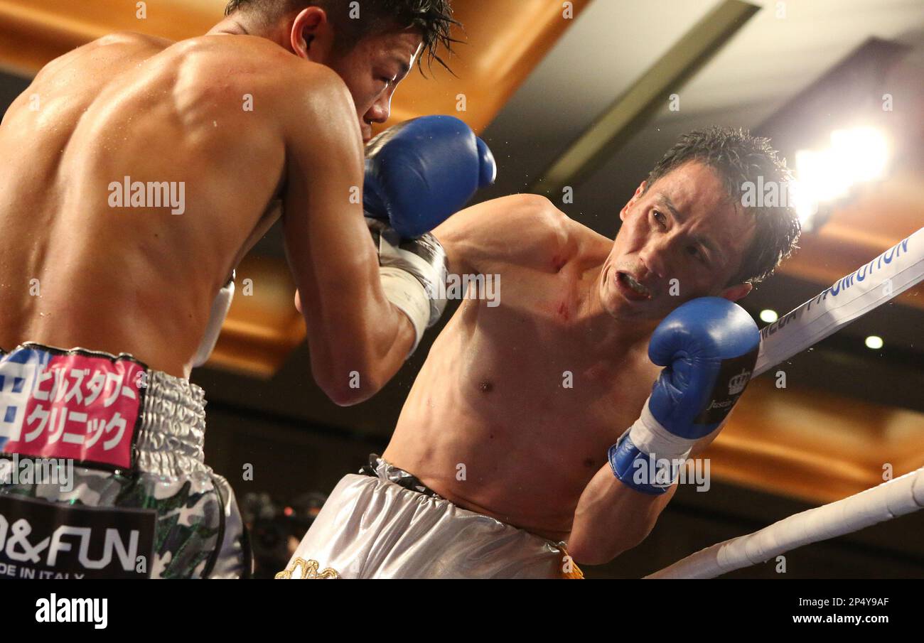 Champion Koki Kameda, left, of Japan fights with challenger Son Jeong ...