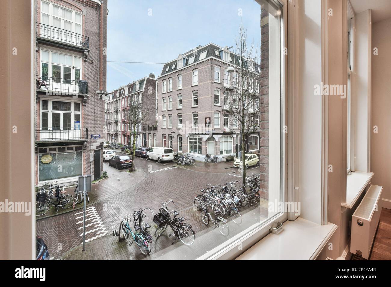 Amsterdam, Netherlands - 10 April, 2021: bikes parked in front of a ...