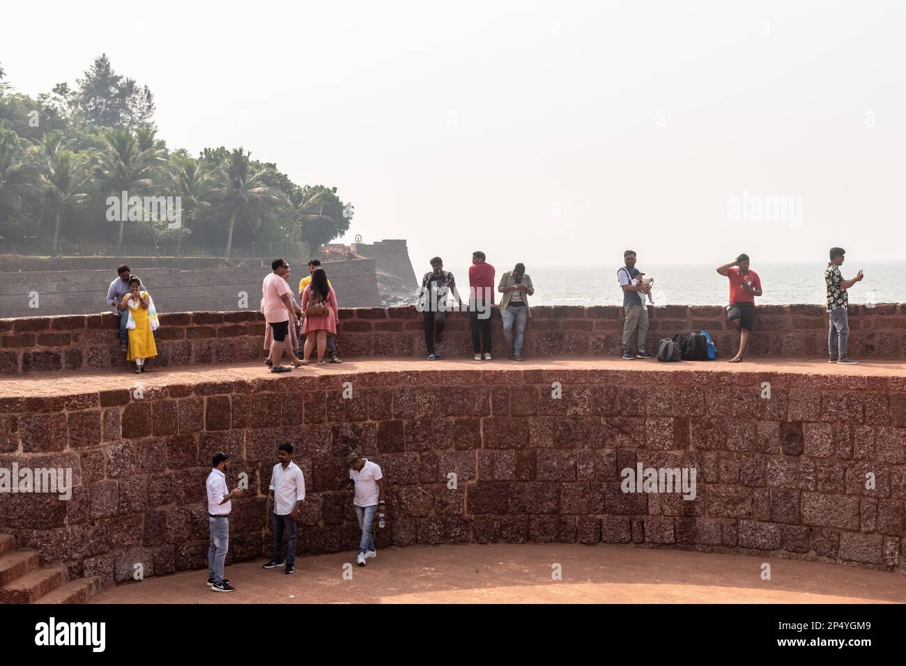 Candolim, Goa, India - January 2023: Large group of Indian tourists ...