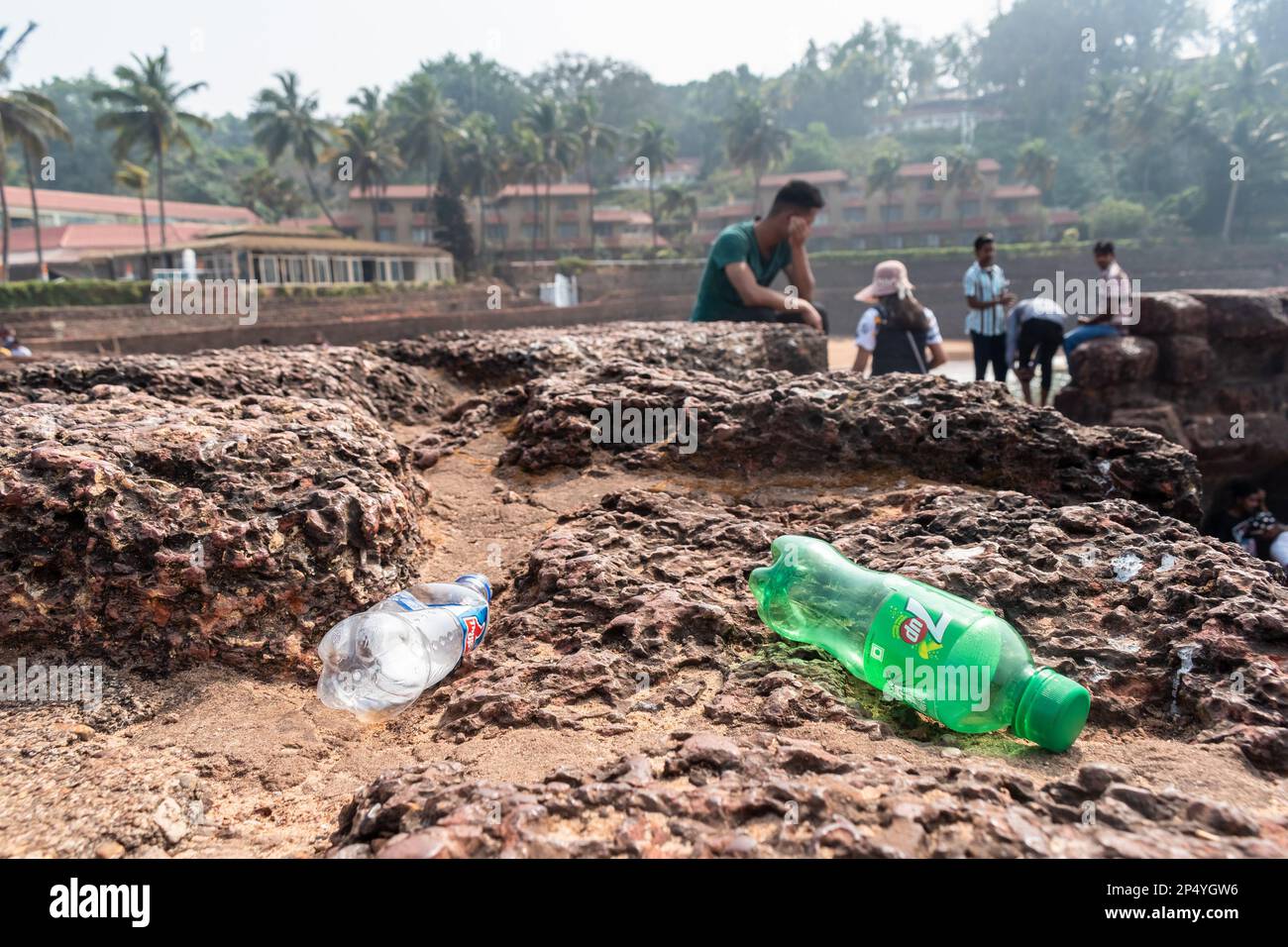 Candolim, Goa, India - January 2023: Plastic bottles and trash littered ...