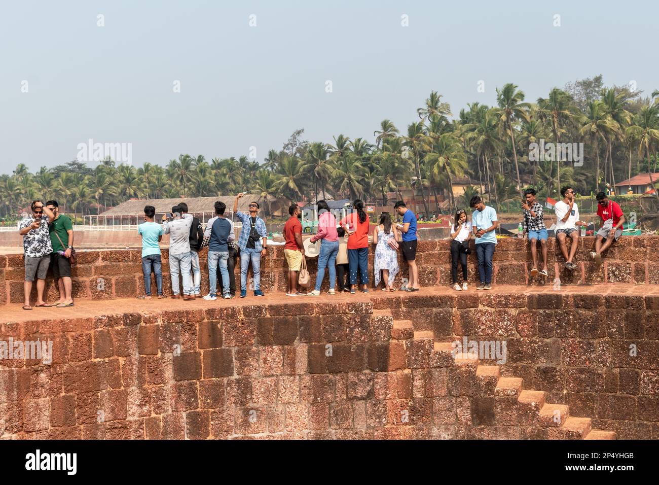Candolim, Goa, India - January 2023: Crowd of Indian tourists at the ...