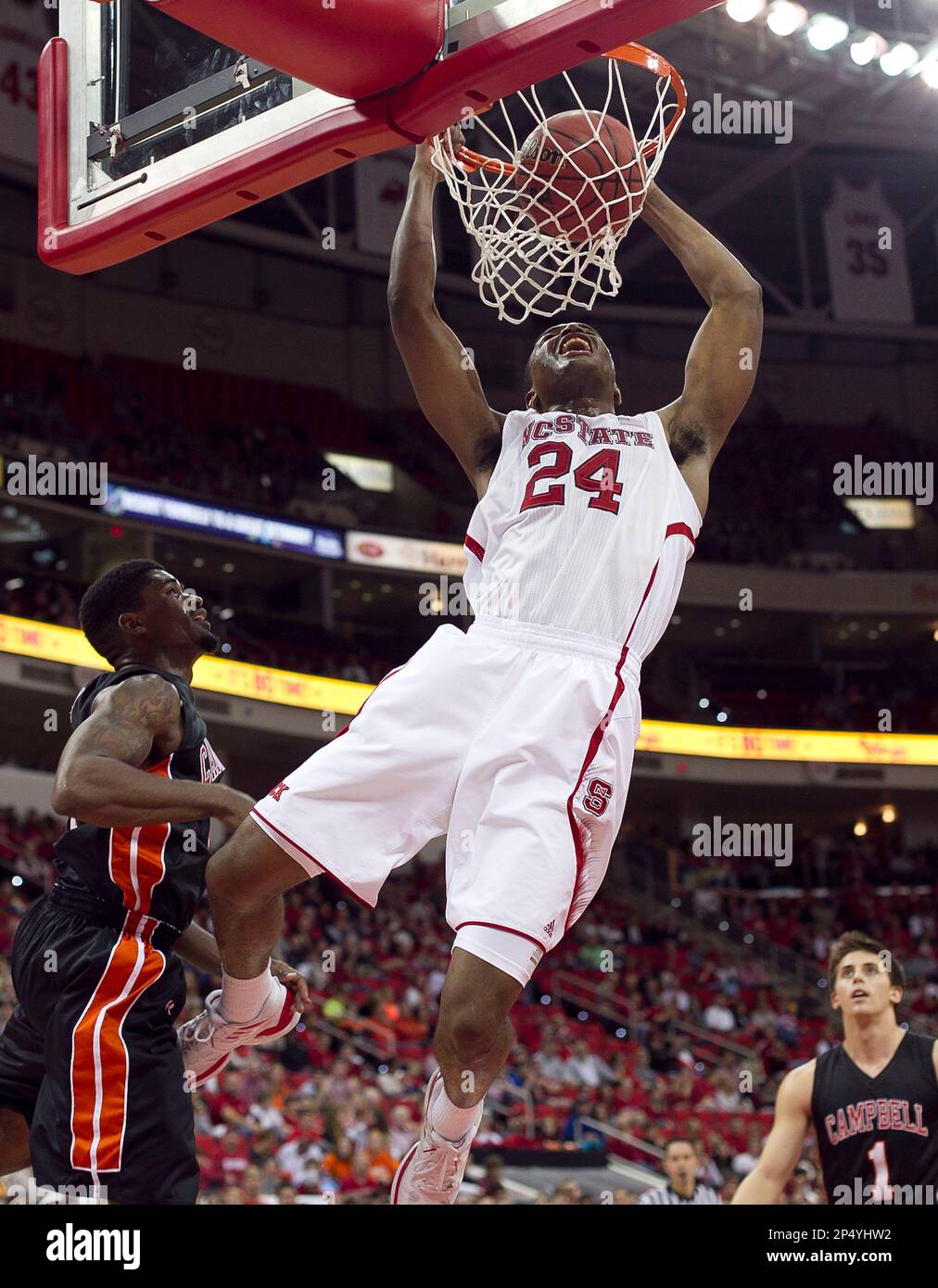 North Carolina State's T.J. Warren (24) dunks over Campbell's Quinton ...