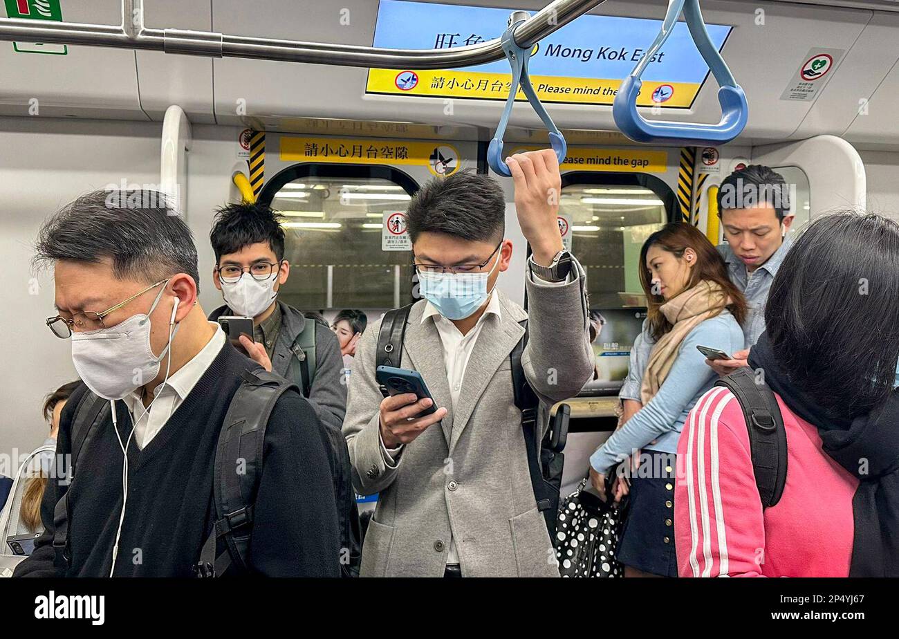 Commuters on MTR in Mong Kok on the first day of mask mandate has been ...