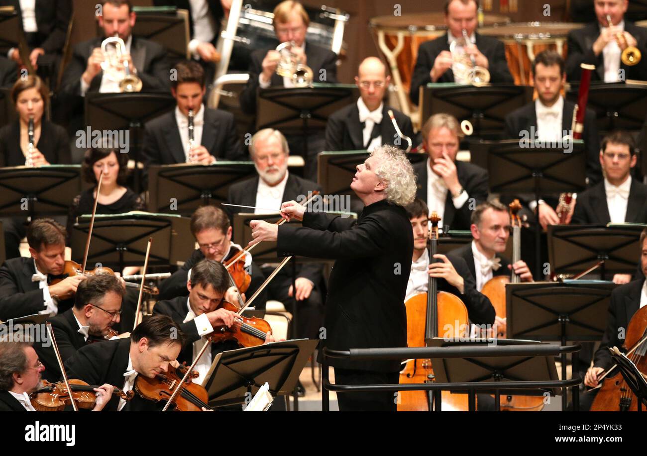 British conductor Sir Simon Rattle conducts Berlin Philharmonic at ...