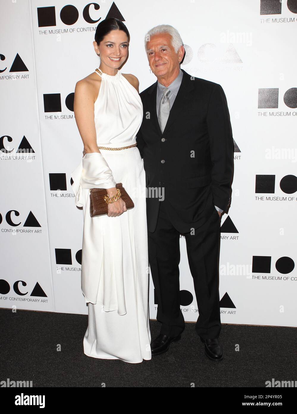 Nathalie Marciano and Maurice Marciano arrive at the MOCA Gala 2011 ...