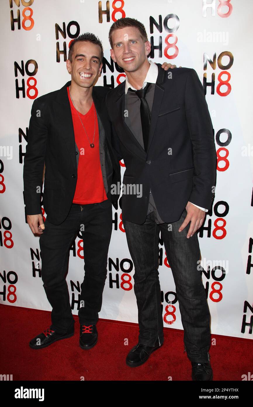 NOH8 Campaign co-founders Adam Bouska (L) and Jeff Parshley attends the ...