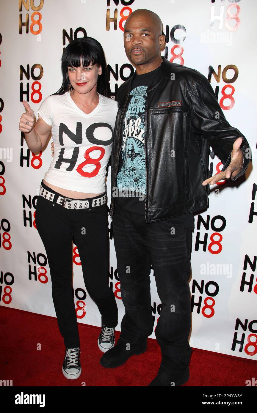 Darryl "DMC" McDaniels and Pauley Perrette attend the NOH8 Campaign's 3 ...