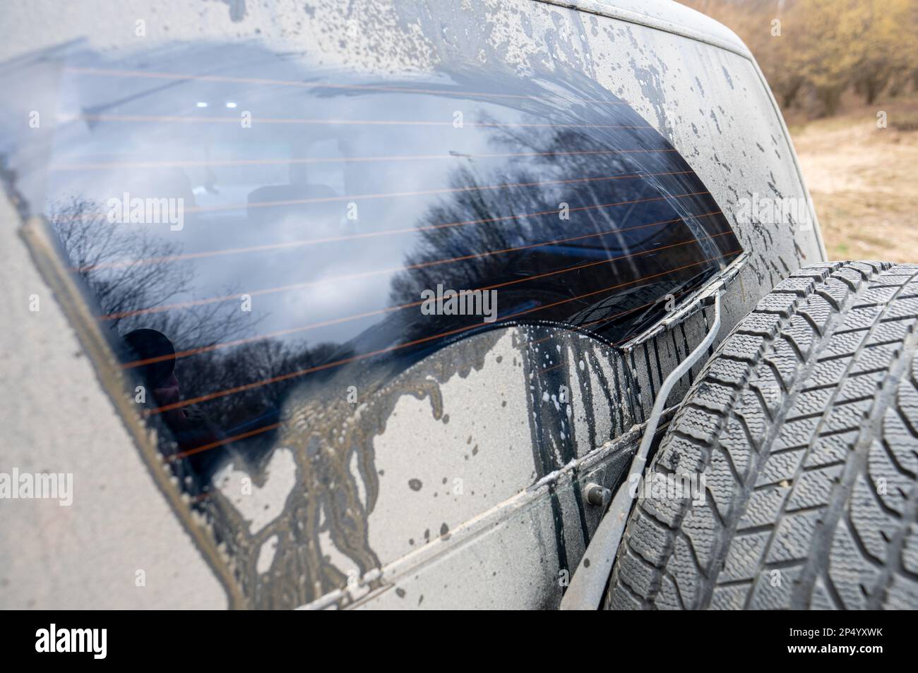 Dirty car rear window. Adventure background. Detail of dirty off-road ...