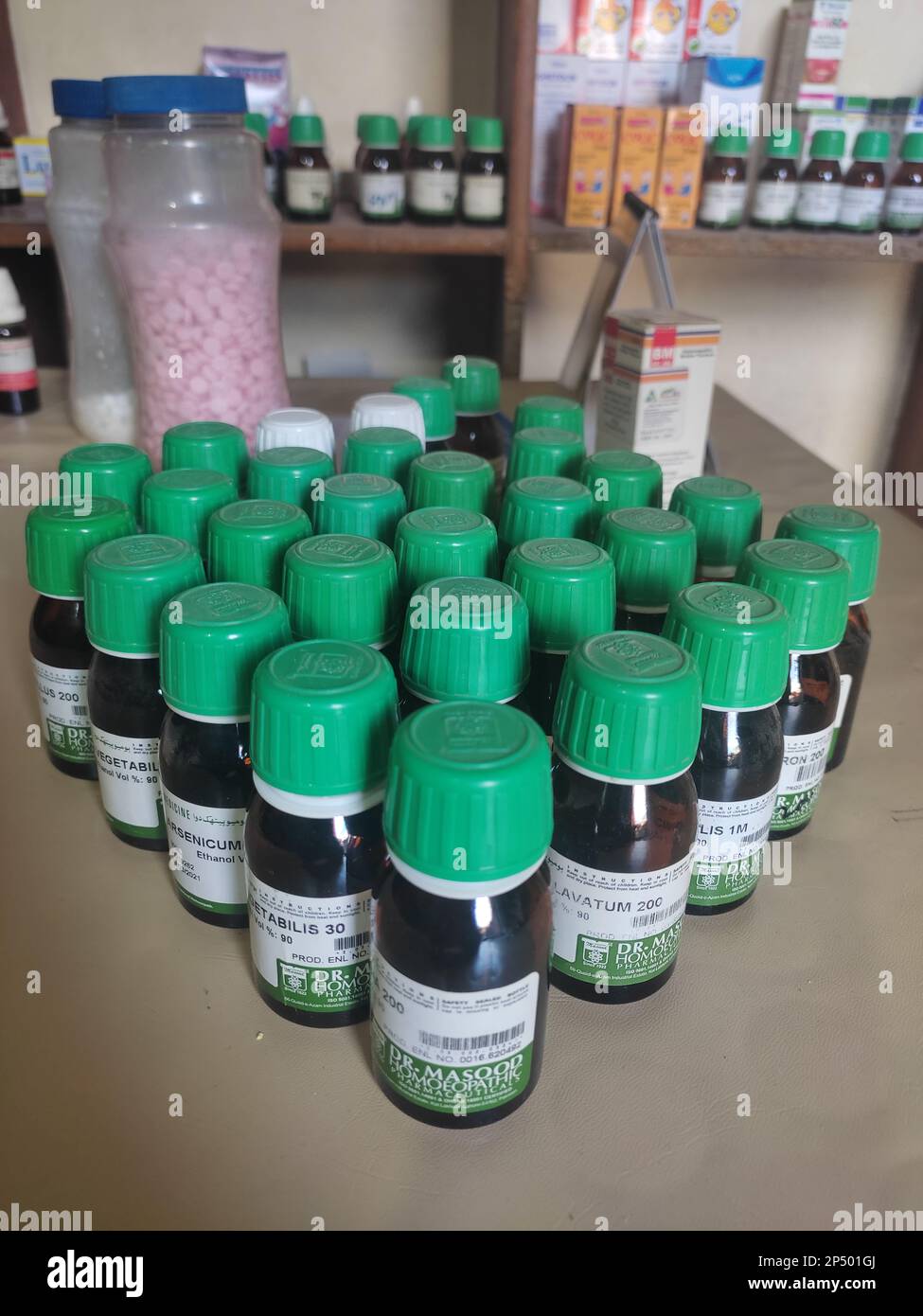 Homeopathic medicine consisting of the pills and a bottle containing a ...